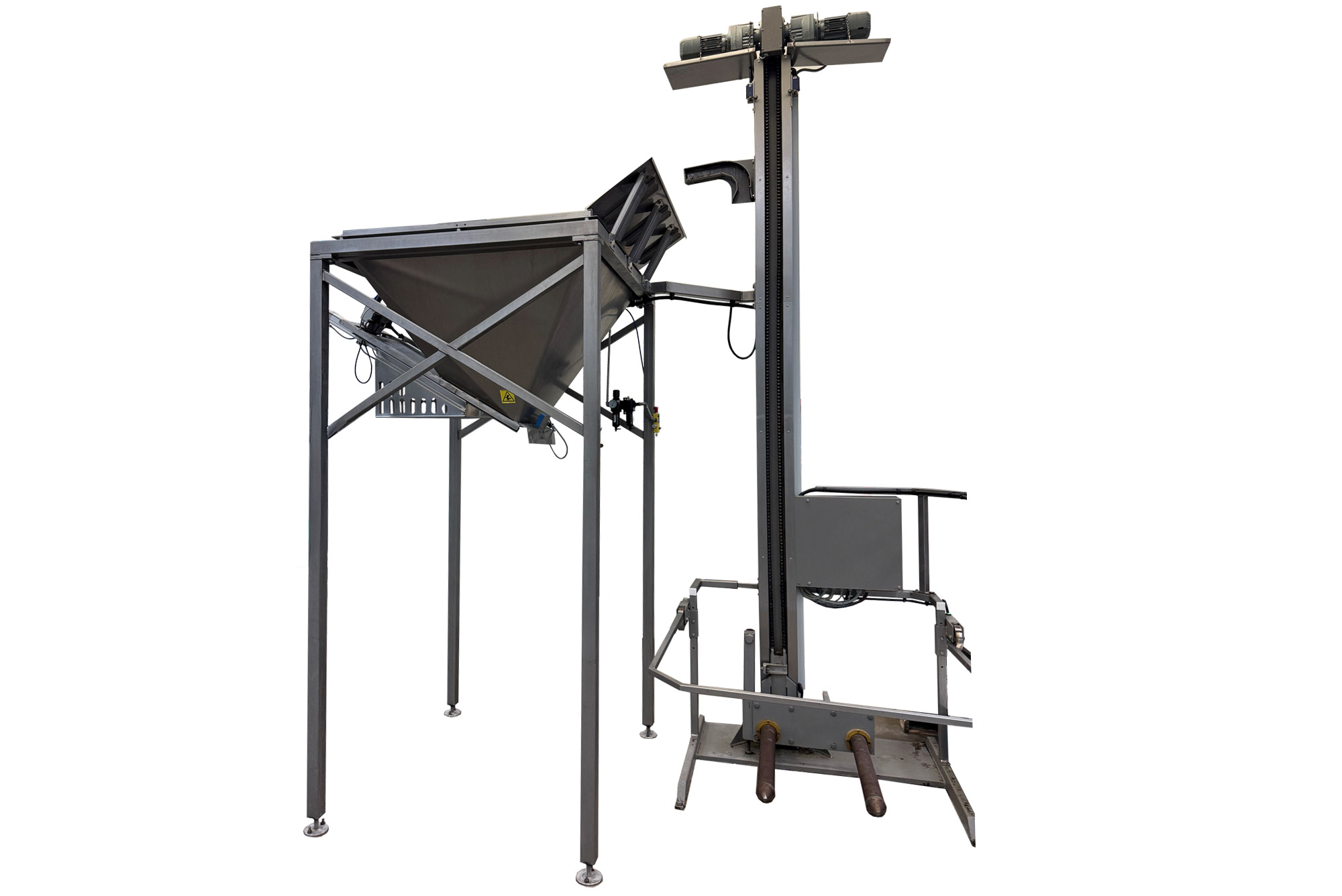 Glimek vertical post style hoist-dumper with slide gate chunker | Topos ...